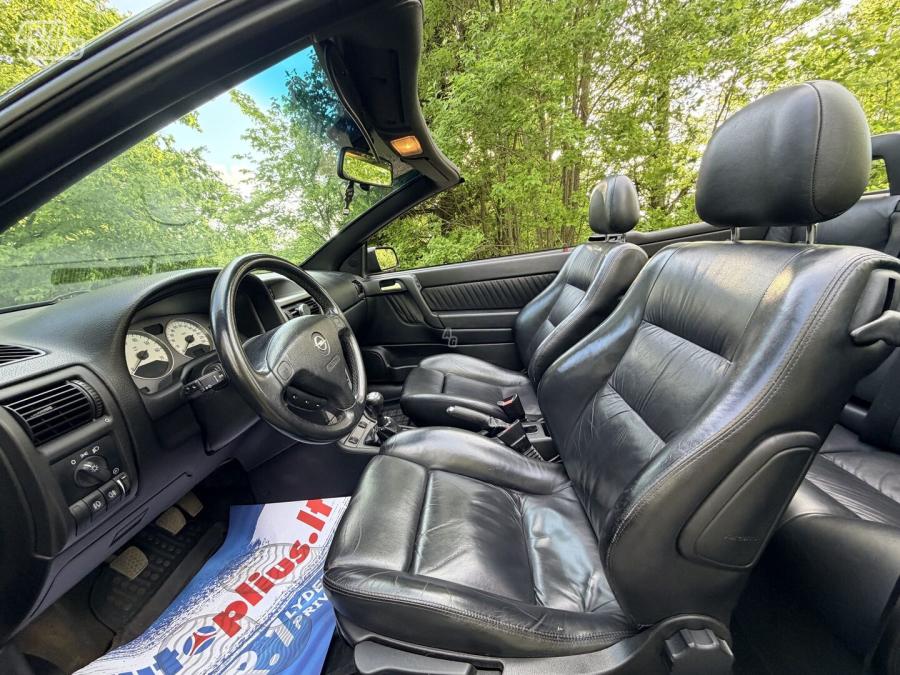 Black Opel Astra 2002 in Utena, with an engine capacity of 2.20 L and mileage of 287 thousand km for 1950 €, photo 22 on AUTOMOTO.COM.LV
