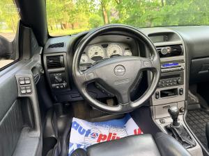 Black Opel Astra 2002 in Utena, with an engine capacity of 2.20 L and mileage of 287 thousand km for 1950 €, photo 25 on AUTOMOTO.COM.LV