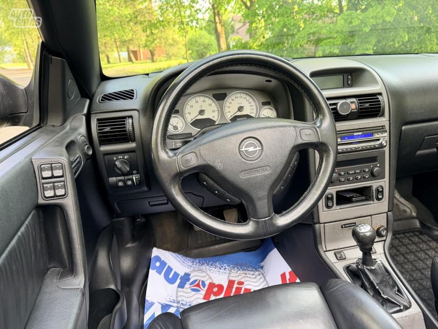 Black Opel Astra 2002 in Utena, with an engine capacity of 2.20 L and mileage of 287 thousand km for 1950 €, photo 25 on AUTOMOTO.COM.LV