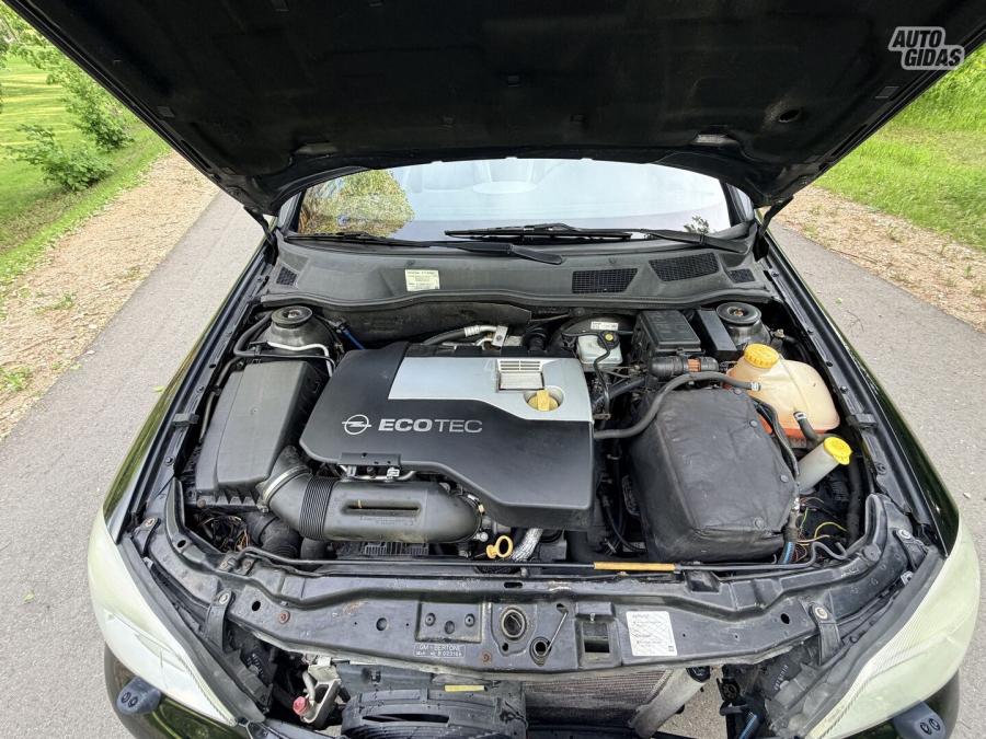 Black Opel Astra 2002 in Utena, with an engine capacity of 2.20 L and mileage of 287 thousand km for 1950 €, photo 26 on AUTOMOTO.COM.LV