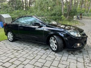 Black Opel Astra 2008 in Riga, with an engine capacity of 1.90 L and mileage of 245 thousand km for 1500 €, photo 5 on AUTOMOTO.COM.LV