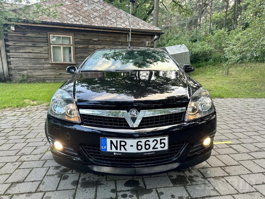 Black Opel Astra 2008 in Riga, with an engine capacity of 1.90 L and mileage of 245 thousand km for 1500 €, photo 6 on AUTOMOTO.COM.LV