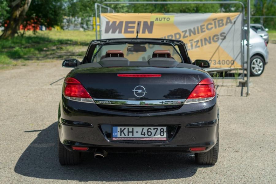 Melns Opel Astra 2008 Rīga, ar dzinēja tilpumu 1.90 L un nobraukumu 202 tūkst. km par 2300 €, foto 4 vietnē AUTOMOTO.COM.LV