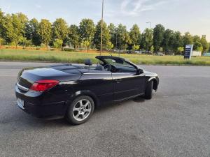 Black Opel Astra 2008 in Kaunas, with an engine capacity of 1.90 L and mileage of 308 thousand km for 1600 €, photo 5 on AUTOMOTO.COM.LV