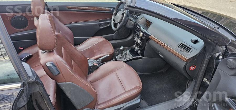 Melns Opel Astra 2008 Rīga, ar dzinēja tilpumu 1.90 L un nobraukumu 292 tūkst. km par 3500 €, foto 9 vietnē AUTOMOTO.COM.LV