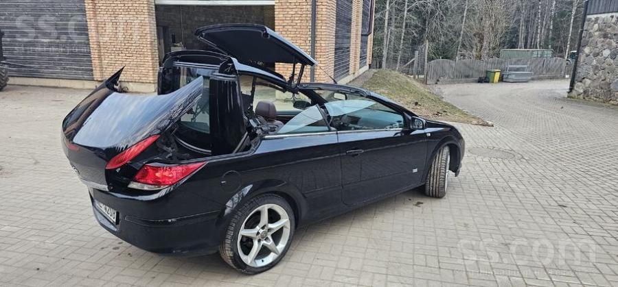 Melns Opel Astra 2008 Rīga, ar dzinēja tilpumu 1.90 L un nobraukumu 292 tūkst. km par 3500 €, foto 13 vietnē AUTOMOTO.COM.LV