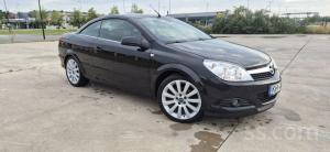 Black Opel Astra 2008 in Riga, with an engine capacity of 1.90 L and mileage of 210 thousand km for 3690 €, photo 6 on AUTOMOTO.COM.LV