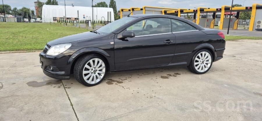 Black Opel Astra 2008 in Riga, with an engine capacity of 1.90 L and mileage of 210 thousand km for 3690 €, photo 7 on AUTOMOTO.COM.LV