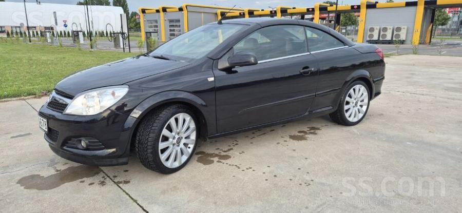 Black Opel Astra 2008 in Riga, with an engine capacity of 1.90 L and mileage of 210 thousand km for 3690 €, photo 8 on AUTOMOTO.COM.LV