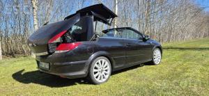 Black Opel Astra 2008 in Riga, with an engine capacity of 1.90 L and mileage of 210 thousand km for 3690 €, photo 12 on AUTOMOTO.COM.LV