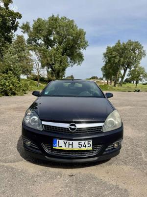 Black Opel Astra 2008 in Kaunas, with an engine capacity of 1.90 L and mileage of 311 thousand km for 2200 €, photo 8 on AUTOMOTO.COM.LV