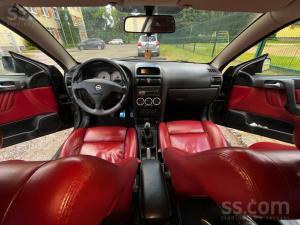 Black Opel Astra 2001 in Daugavpils, with an engine capacity of 2.20 L and mileage of 300 thousand km for 2200 €, photo 3 on AUTOMOTO.COM.LV