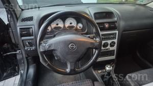 Melns Opel Astra 2002 Rīga, ar dzinēja tilpumu 2.20 L un nobraukumu 180 tūkst. km par 5000 €, foto 5 vietnē AUTOMOTO.COM.LV