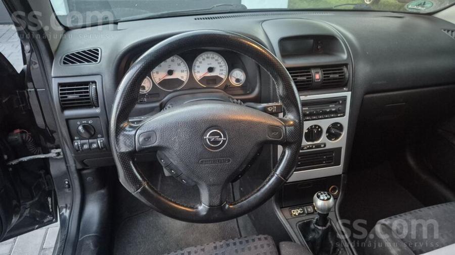 Melns Opel Astra 2002 Rīga, ar dzinēja tilpumu 2.20 L un nobraukumu 180 tūkst. km par 5000 €, foto 5 vietnē AUTOMOTO.COM.LV