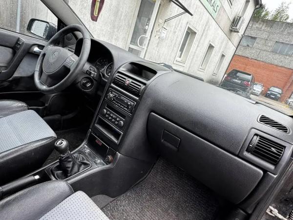 Melns Opel Astra 2004 Daugavpils, ar dzinēja tilpumu 2.20 L un nobraukumu 448 tūkst. km par 1290 €, foto 8 vietnē AUTOMOTO.COM.LV