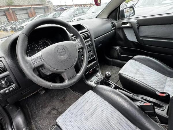 Melns Opel Astra 2004 Daugavpils, ar dzinēja tilpumu 2.20 L un nobraukumu 448 tūkst. km par 1290 €, foto 10 vietnē AUTOMOTO.COM.LV