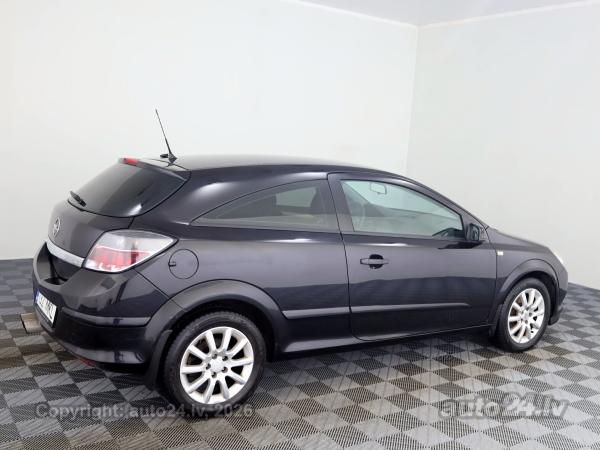 Black Opel Astra 2007 in Tallinn, with an engine capacity of 1.60 L and mileage of 259 thousand km for 899 €, photo 3 on AUTOMOTO.COM.LV