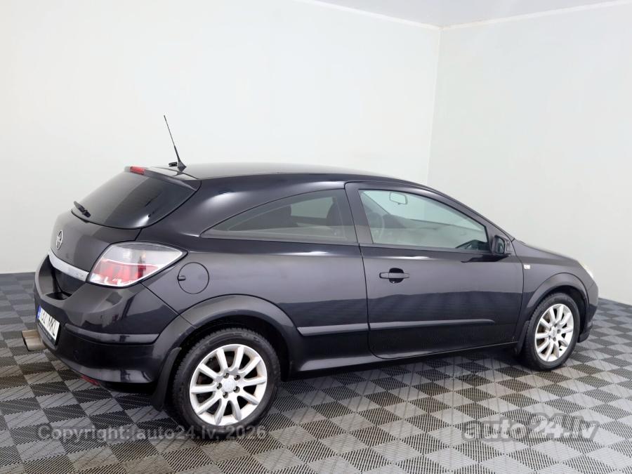 Black Opel Astra 2007 in Tallinn, with an engine capacity of 1.60 L and mileage of 259 thousand km for 899 €, photo 4 on AUTOMOTO.COM.LV
