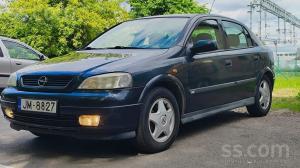 Black Opel Astra 1998 in Riga, with an engine capacity of 2.00 L and mileage of 341 thousand km for 1350 €, photo 1 on AUTOMOTO.COM.LV