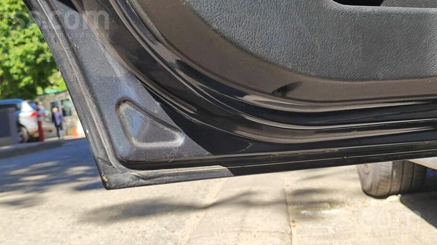 Black Opel Astra 1998 in Riga, with an engine capacity of 2.00 L and mileage of 341 thousand km for 1350 €, photo 6 on AUTOMOTO.COM.LV
