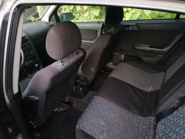 Black Opel Astra 2000 in Moletai, with an engine capacity of 2.00 L and mileage of 367 thousand km for 380 €, photo 10 on AUTOMOTO.COM.LV