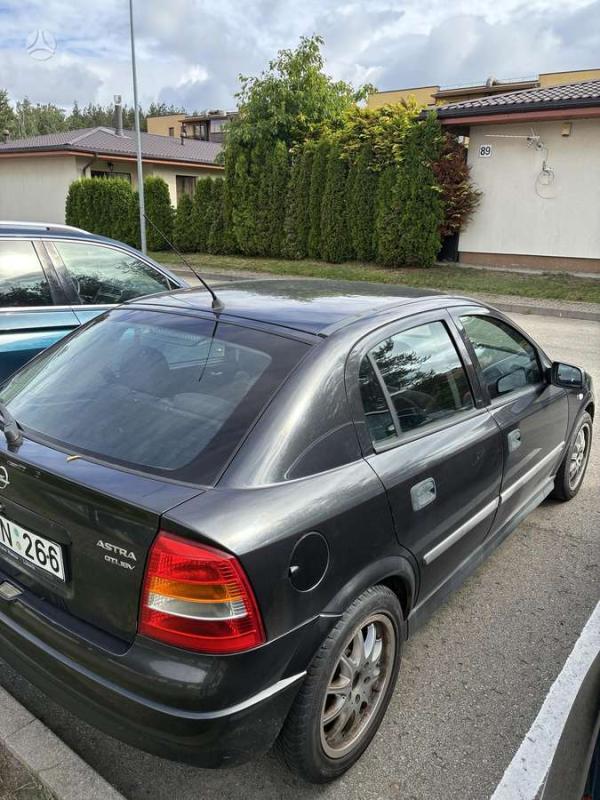 Melns Opel Astra 2000 Viļņa, ar dzinēja tilpumu 2.00 L un nobraukumu 297 tūkst. km par 850 €, foto 5 vietnē AUTOMOTO.COM.LV