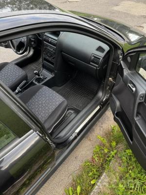 Black Opel Astra 2000 in Riga, with an engine capacity of 1.60 L and mileage of 244 thousand km for 300 €, photo 9 on AUTOMOTO.COM.LV