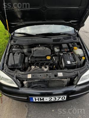 Black Opel Astra 2000 in Riga, with an engine capacity of 1.60 L and mileage of 244 thousand km for 300 €, photo 11 on AUTOMOTO.COM.LV