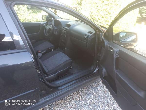 Melns Opel Astra 2001 Viļņa, ar dzinēja tilpumu 1.70 L un nobraukumu 250 tūkst. km par 1250 €, foto 4 vietnē AUTOMOTO.COM.LV