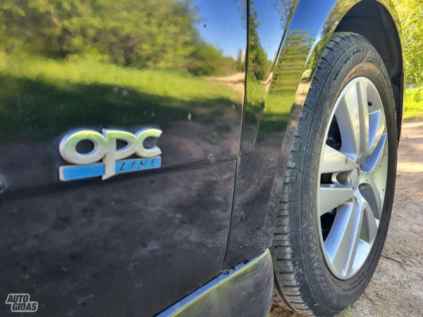 Black Opel Astra 2006 in Vilnius, with an engine capacity of 1.70 L and mileage of 260 thousand km for 1550 €, photo 8 on AUTOMOTO.COM.LV