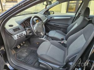Melns Opel Astra 2006 Liepāja, ar dzinēja tilpumu 1.90 L un nobraukumu 334 tūkst. km par 2050 €, foto 11 vietnē AUTOMOTO.COM.LV
