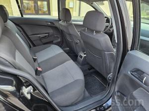 Melns Opel Astra 2006 Liepāja, ar dzinēja tilpumu 1.90 L un nobraukumu 334 tūkst. km par 2050 €, foto 14 vietnē AUTOMOTO.COM.LV