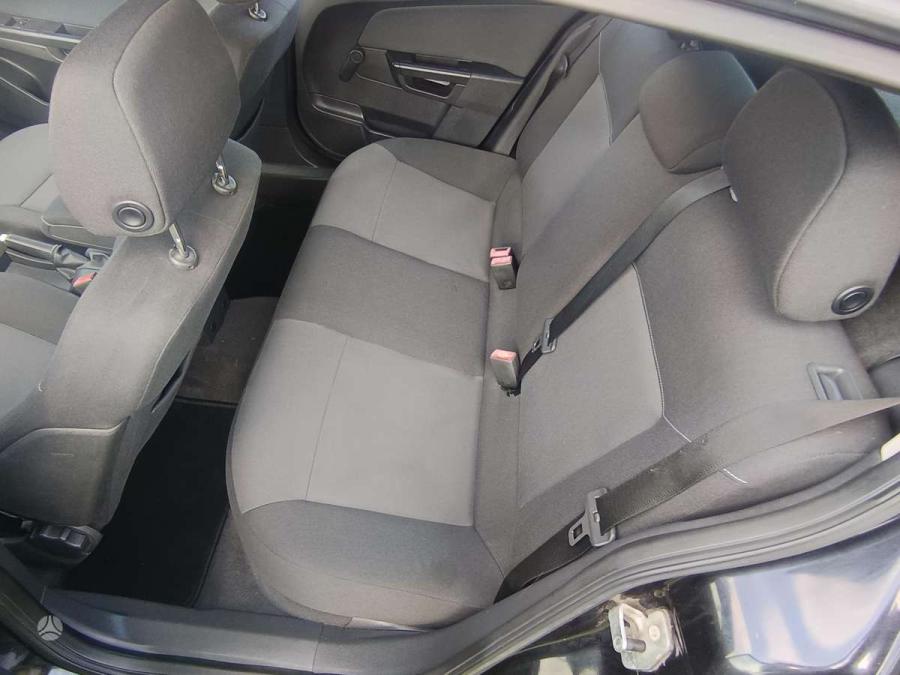 Black Opel Astra 2007 in Kaunas, with an engine capacity of 1.60 L and mileage of 173 thousand km for 1450 €, photo 21 on AUTOMOTO.COM.LV