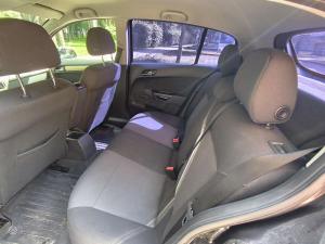 Black Opel Astra 2008 in Mazeikiai, with an engine capacity of 1.69 L and mileage of 178 thousand km for 1200 €, photo 12 on AUTOMOTO.COM.LV