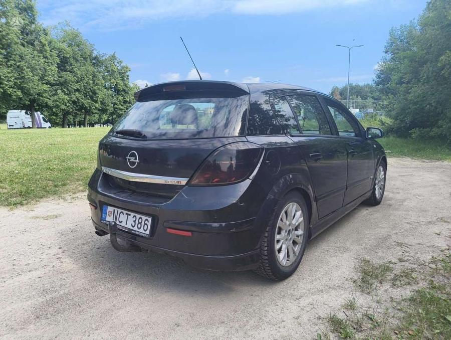 Melns Opel Astra 2009 Viļņa, ar dzinēja tilpumu 1.91 L un nobraukumu 240 tūkst. km par 700 €, foto 5 vietnē AUTOMOTO.COM.LV