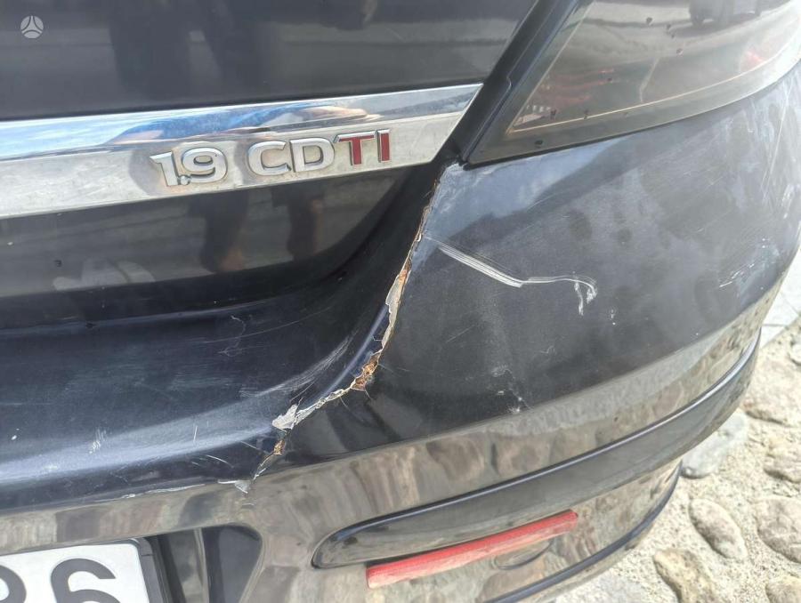 Melns Opel Astra 2009 Viļņa, ar dzinēja tilpumu 1.91 L un nobraukumu 240 tūkst. km par 700 €, foto 13 vietnē AUTOMOTO.COM.LV