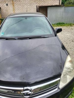 Black Opel Astra 2009 in Kaunas, with an engine capacity of 1.60 L and mileage of 220 thousand km for 1400 €, photo 10 on AUTOMOTO.COM.LV