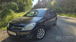 Black Opel Astra 2010 in Riga, with an engine capacity of 1.60 L and mileage of 213 thousand km for 2850 €, photo 6 on AUTOMOTO.COM.LV
