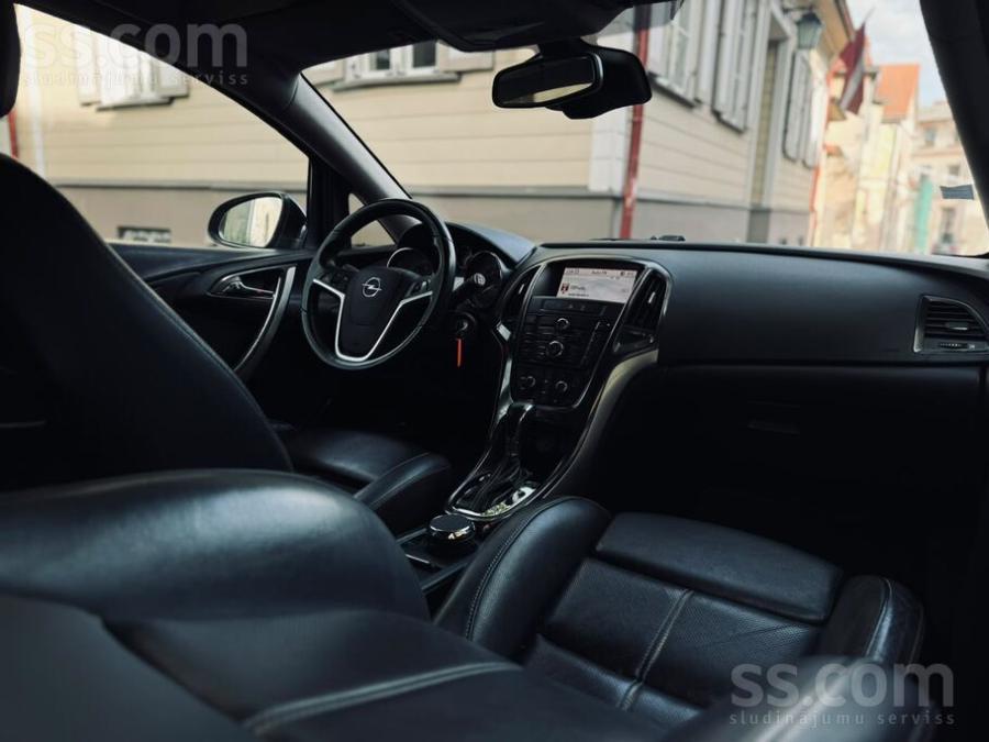 Black Opel Astra 2010 in Cesis, with an engine capacity of 2.00 L and mileage of 0 thousand km for 4750 €, photo 14 on AUTOMOTO.COM.LV