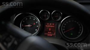 Black Opel Astra 2010 in Riga, with an engine capacity of 1.40 L and mileage of 247 thousand km for 2290 €, photo 11 on AUTOMOTO.COM.LV