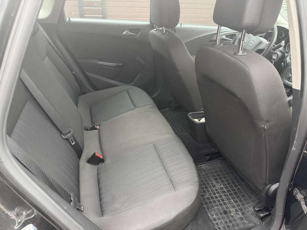 Black Opel Astra 2010 in Moletai, with an engine capacity of 1.69 L and mileage of 264 thousand km for 2299 €, photo 8 on AUTOMOTO.COM.LV