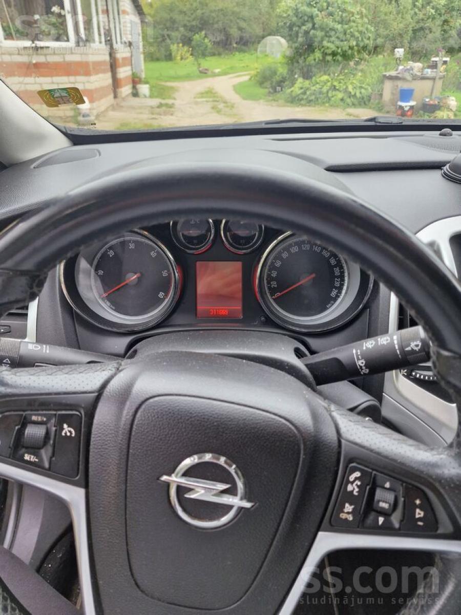 Melns Opel Astra 2010 Saldus, ar dzinēja tilpumu 1.70 L un nobraukumu 312 tūkst. km par 2000 €, foto 6 vietnē AUTOMOTO.COM.LV