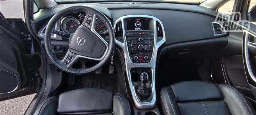 Black Opel Astra 2011 in Klaipeda, with an engine capacity of 1.60 L and mileage of 234 thousand km for 3200 €, photo 11 on AUTOMOTO.COM.LV