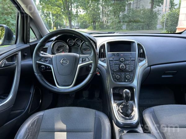 Black Opel Astra 2011 in Riga, with an engine capacity of 1.40 L and mileage of 271 thousand km for 4500 €, photo 9 on AUTOMOTO.COM.LV