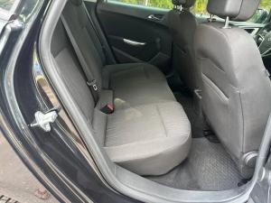 Black Opel Astra 2011 in Ogre, with an engine capacity of 1.60 L and mileage of 180 thousand km for 4400 €, photo 12 on AUTOMOTO.COM.LV