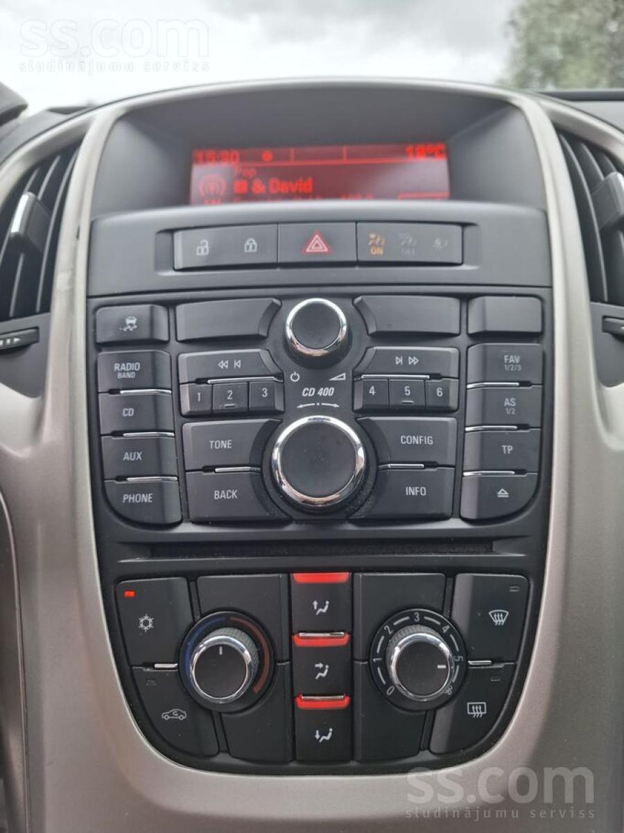 Black Opel Astra 2011 in Talsi, with an engine capacity of 1.30 L and mileage of 457 thousand km for 2650 €, photo 11 on AUTOMOTO.COM.LV