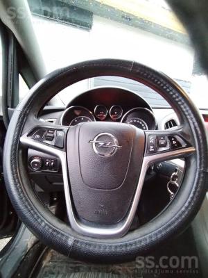 Black Opel Astra 2011 in Talsi, with an engine capacity of 1.30 L and mileage of 457 thousand km for 2650 €, photo 12 on AUTOMOTO.COM.LV