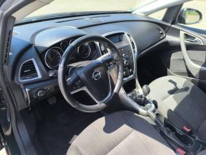 Black Opel Astra 2011 in Marijampole, with an engine capacity of 1.40 L and mileage of 185 thousand km for 2848 €, photo 9 on AUTOMOTO.COM.LV