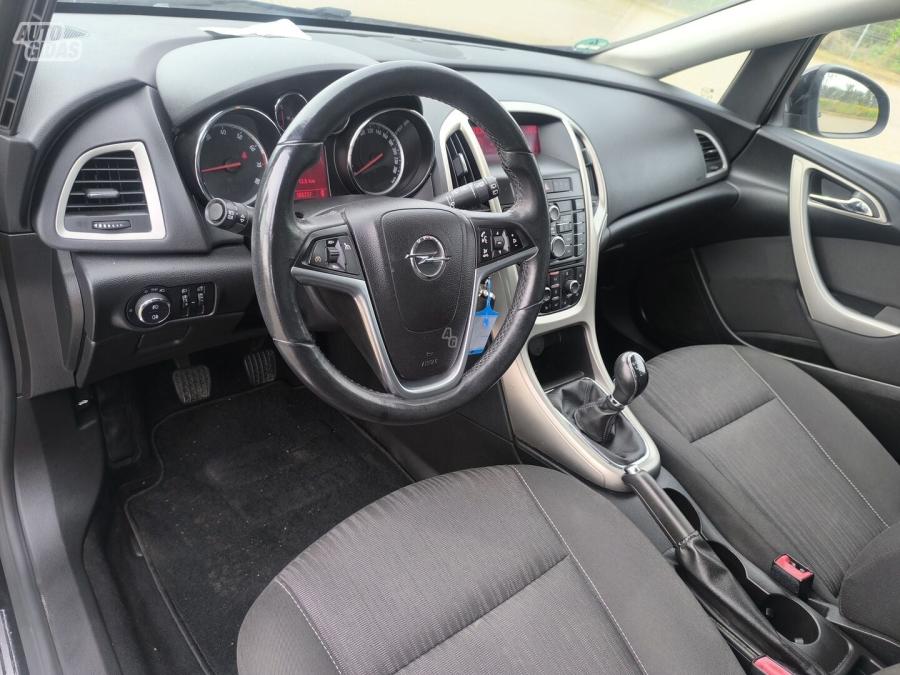 Black Opel Astra 2011 in Marijampole, with an engine capacity of 1.40 L and mileage of 185 thousand km for 2850 €, photo 10 on AUTOMOTO.COM.LV