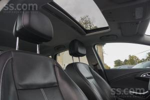 Black Opel Astra 2011 in Riga, with an engine capacity of 2.00 L and mileage of 241 thousand km for 4990 €, photo 7 on AUTOMOTO.COM.LV